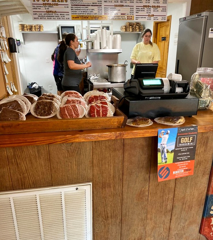 The counter where magic happens. Those fresh cuts of meat aren't just ingredients&mdash;they're promises of happiness waiting to be fulfilled.