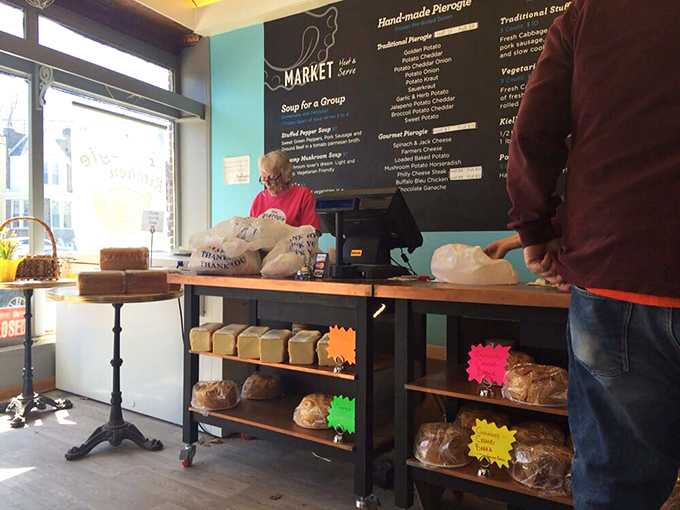 aBehind this counter, the magic happens &ndash; where flour, potatoes, and love transform into neighborhood happiness.