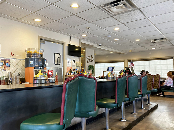 Green vinyl counter stools that have supported generations of hungry travelers and locals alike. Comfort doesn't always need cushioning.