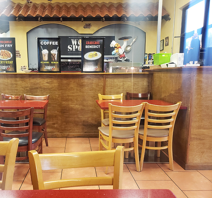 The counter area showcases the diner's personality with decorative spoons that remind you this place takes its name seriously.