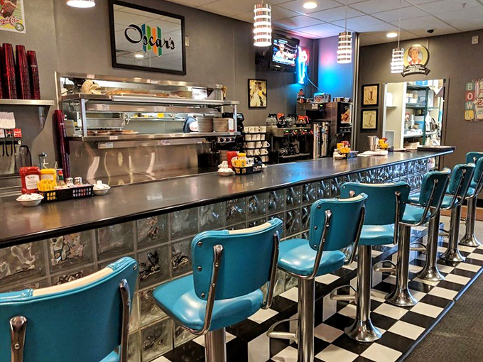 The retro counter with turquoise seats and checkerboard floor isn't just dining&mdash;it's time travel with coffee service.
