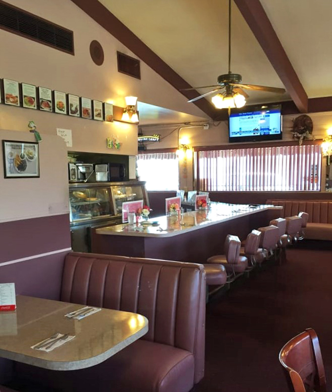 Counter seating where solo diners become part of the Charlie's family and coffee refills appear like magic