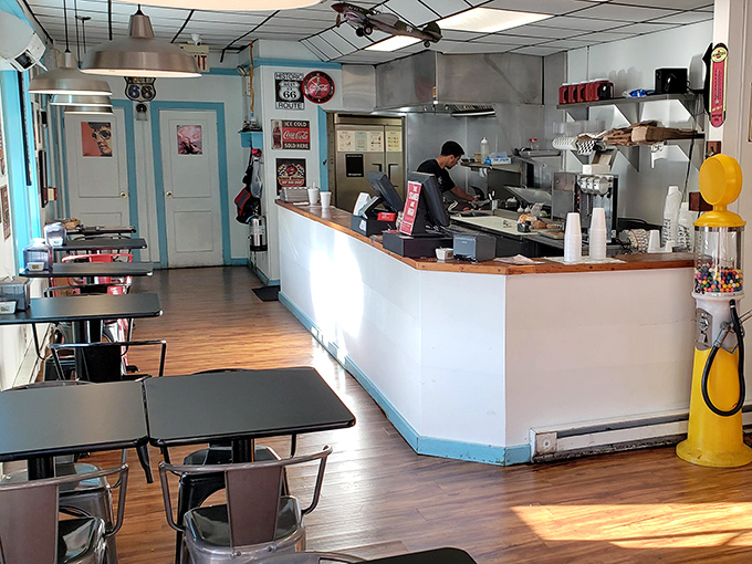 The open kitchen design lets you witness the burger magic happening&mdash;like watching artists at work, but with more sizzle.