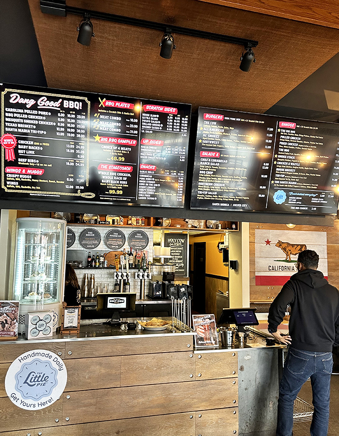Behind the counter, the menu boards promise meat nirvana while the California flag reminds you where this magic happens.
