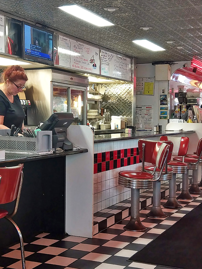 The counter experience: where solo diners become temporary family and watching short-order cooks work their magic is better than any cooking show.
