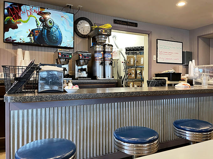The counter where magic happens. Those classic diner stools have heard more good conversations than most therapists' couches.