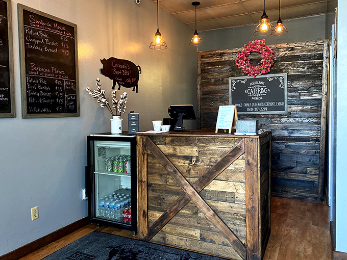The rustic wooden counter welcomes you like an old friend, promising smoky treasures and a staff that knows their barbecue business.