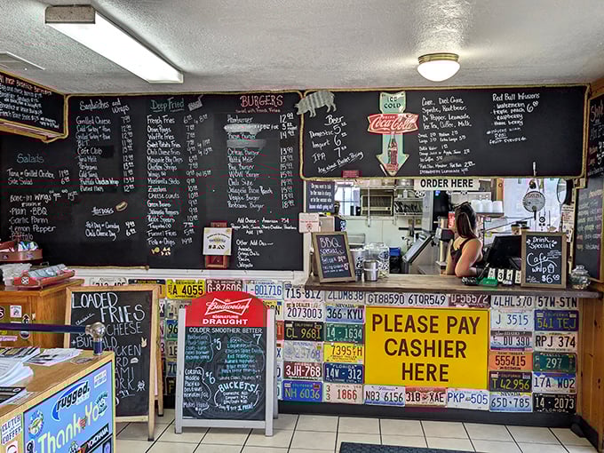 Where the magic happens &ndash; license plates below, handwritten menu above, and endless possibilities in between. Order here, thank yourself later.