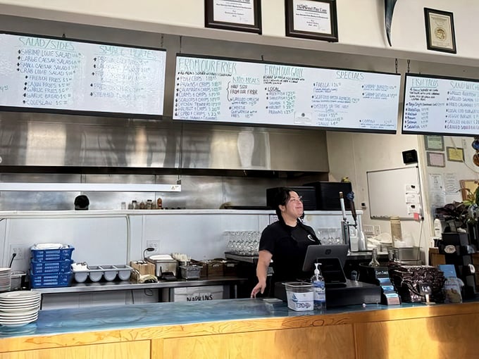 Behind every great seafood joint is a counter where magic happens. The menu boards tell stories of what swam in the ocean just hours ago.
