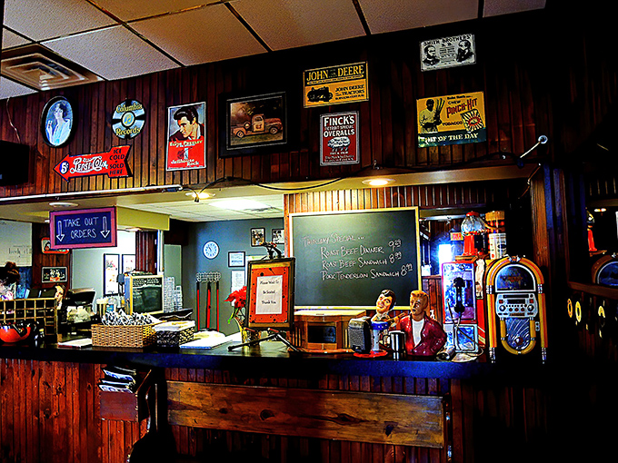Classic diner counter with vintage charm—where John Deere caps meet vintage rock posters in perfect harmony.
