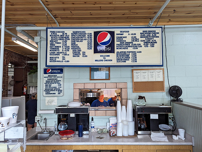 The counter where chicken dreams come true, complete with a menu that hasn't needed trendy updates to stay relevant.