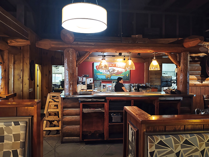 Behind this counter, steak dreams become reality&mdash;a command center where wood-fired magic happens with military precision.