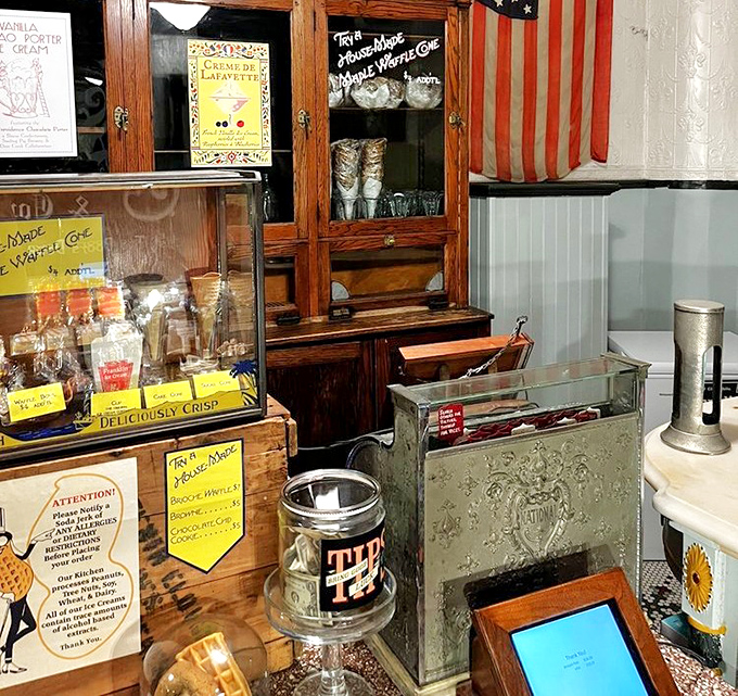 The vintage interior feels like a movie set, but it's deliciously real. Those "Order Here" signs have directed countless ice cream pilgrims to happiness.