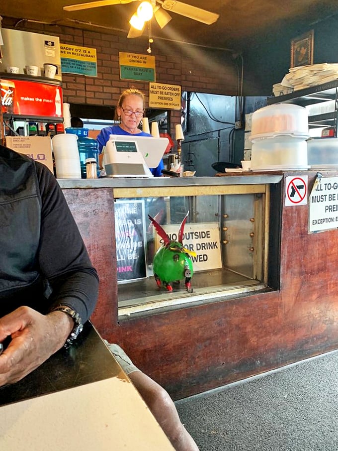 The ordering counter&mdash;where BBQ dreams come true and diet plans go to die. Note the quirky green pig guardian watching over the proceedings.