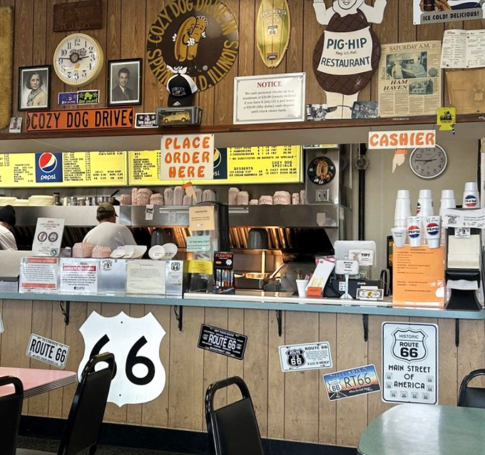 The ordering counter doubles as a museum of Route 66 culture. Place your order here and you're participating in a ritual older than most fast food chains.
