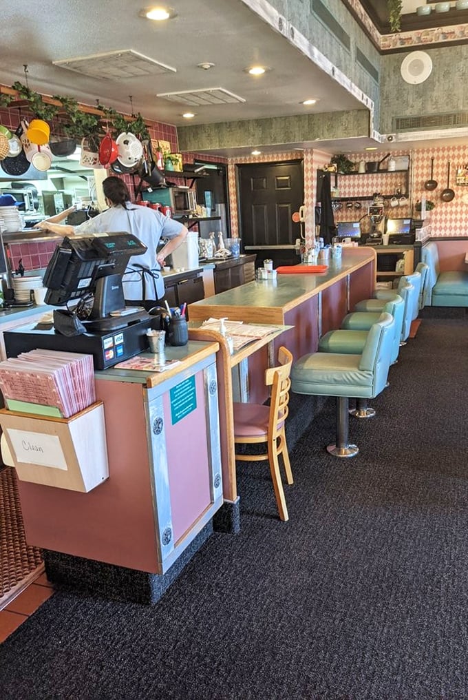 The counter seating &ndash; where solo diners become breakfast connoisseurs and servers perform their morning ballet of plates and coffee refills.