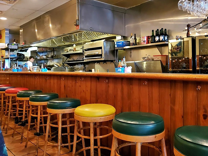 Colorful bar stools await hungry patrons like a maritime welcome committee ready to initiate you into seafood bliss.