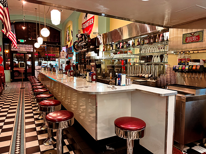 Chrome stools lined up at a gleaming counter&mdash;the best seats in the house for watching short-order magic happen before your eyes.