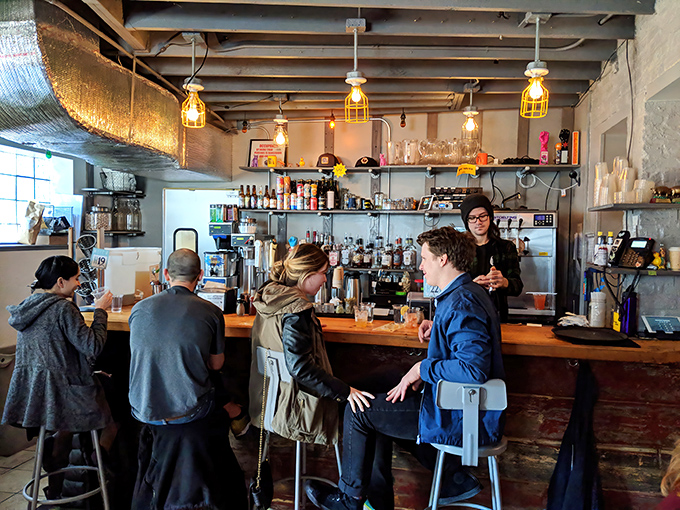 The bar area buzzes with anticipation, where patrons lean in like they're about to hear the secret to happiness. Spoiler: it's chicken.