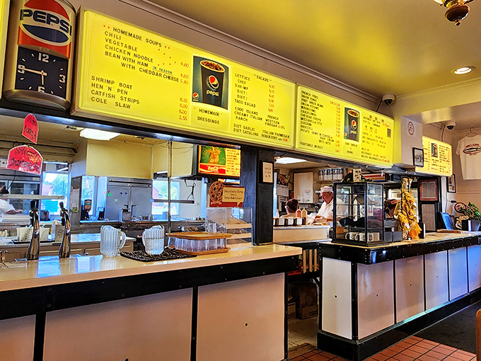 The counter where magic happens—no fancy digital displays, just good food made by people who know what they're doing.