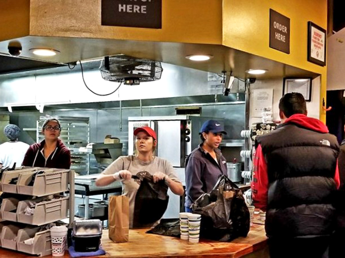 Behind every great barbecue is a team of smoke whisperers, turning ordinary orders into extraordinary memories one tray at a time.