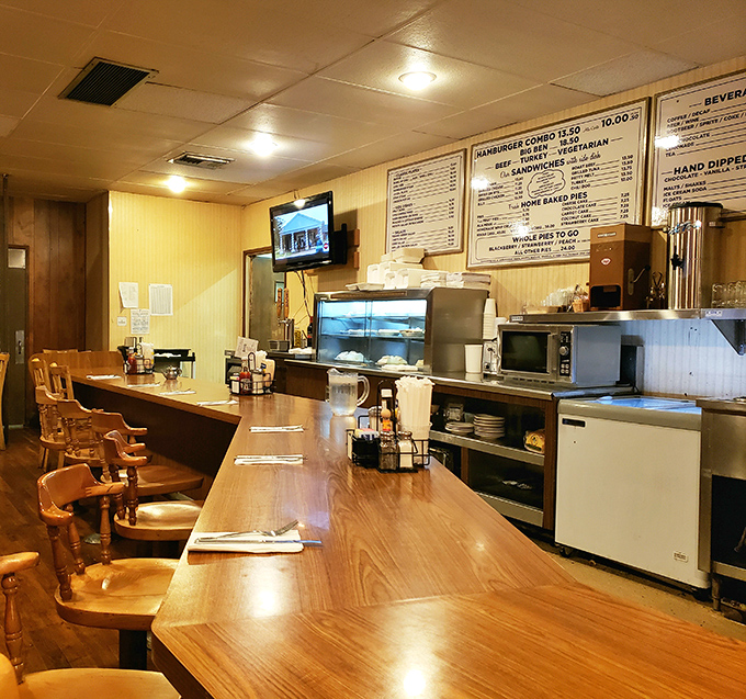 The counter isn't just where you eat&mdash;it's where you witness the theater of short-order cooking, performed by veterans who've mastered every move.