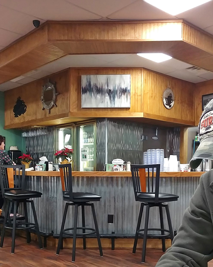 The counter seating area combines beach-town casual with diner efficiency – perfect for solo diners or those who take their pancake consumption seriously.