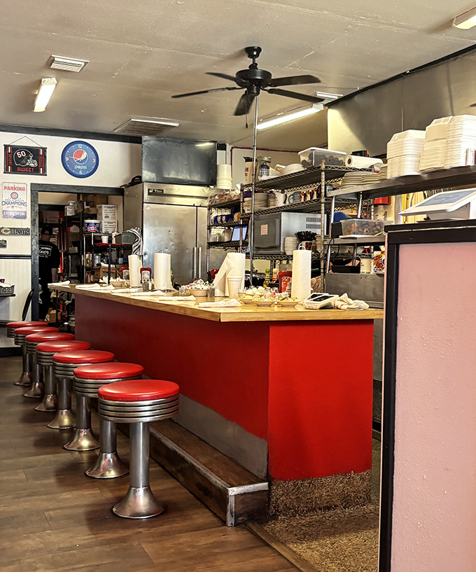 Classic counter seating where solo diners can watch breakfast theater unfold while perched on red vinyl thrones of diner royalty.