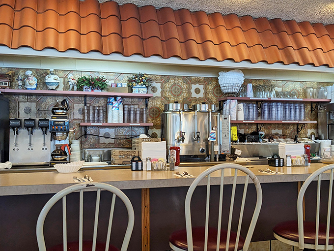 The counter offers front-row seats to the coffee-pouring, order-calling symphony that is diner culture at its most authentic.