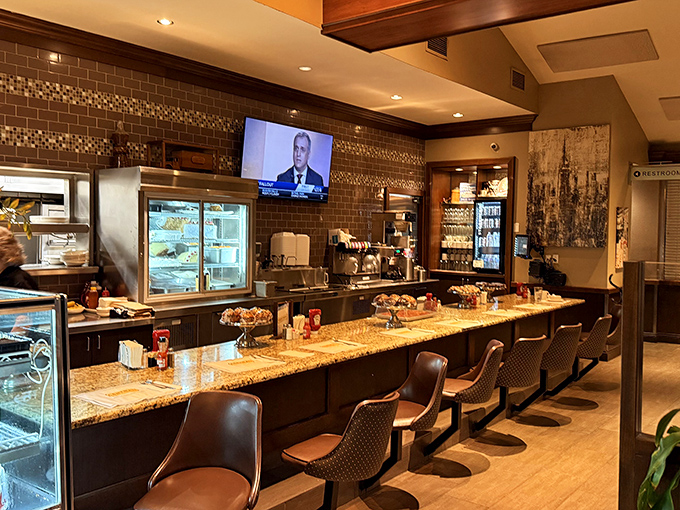 Counter seating: where solo diners become temporary neighbors and the coffee refills flow with blessed regularity. Prime real estate for food voyeurs.