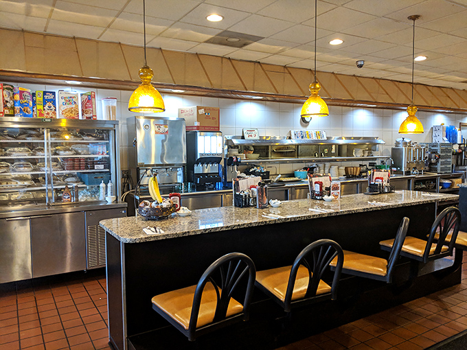 The counter offers front-row seats to the culinary theater. Watch short-order magic happen while contemplating life's important questions, like "Could I add bacon to that?"