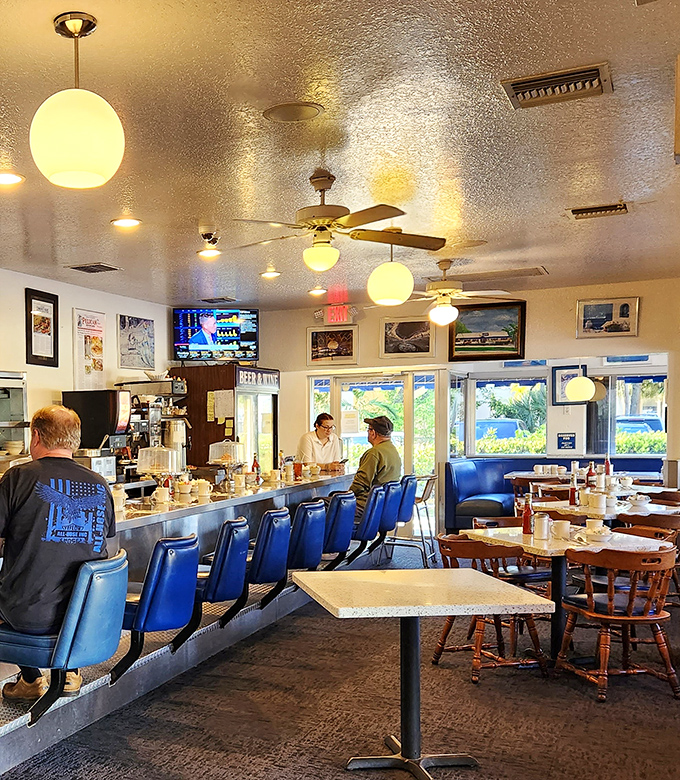 Counter seating: where solo diners become regulars and the coffee keeps flowing as freely as the conversation.