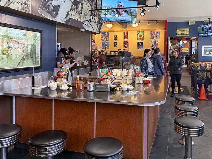 Diner perfection: gleaming countertop, swivel stools, and the promise of enormous portions just moments away.
