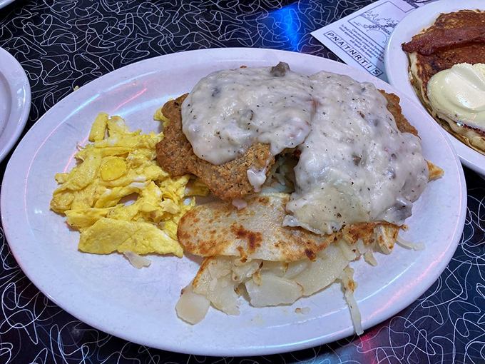 The country fried steak&mdash;golden, crispy, and smothered in gravy that could make a vegetarian question their life choices.