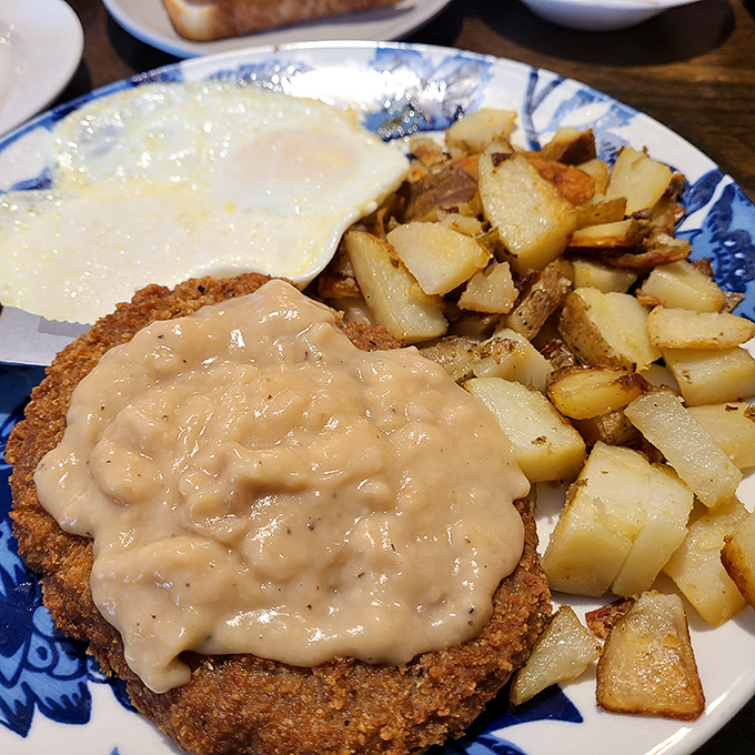 Country fried steak smothered in gravy with perfectly diced potatoes and a sunny-side egg&mdash;the breakfast equivalent of winning the lottery.