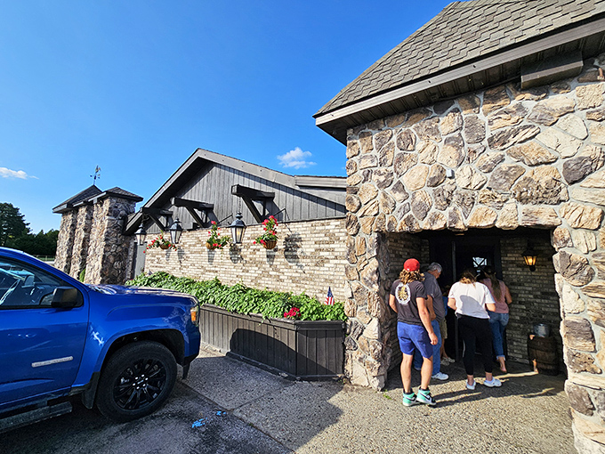 The Court Yard Ristorante's stone facade welcomes hungry visitors like an old friend, promising comfort food with a side of Northwoods atmosphere.