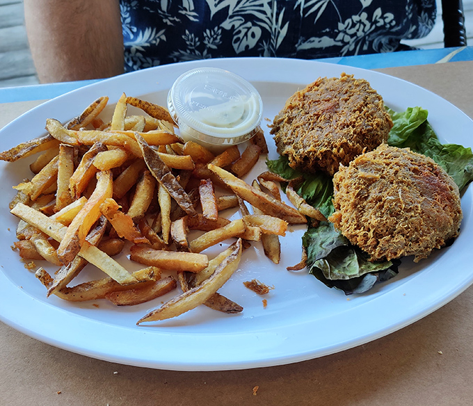 Crab cakes that are all crab, no cake—the way Maryland intended. Served with fries so perfect they deserve their own fan club.