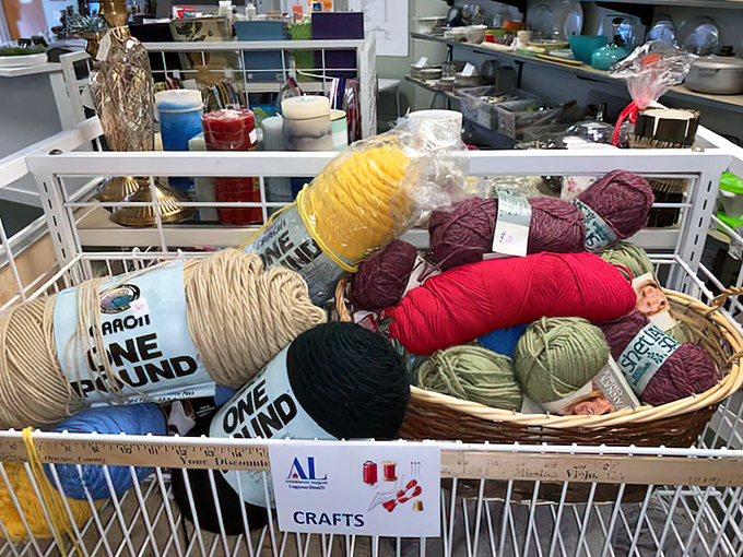 Crafters' corner with yarns in every hue. Someone's abandoned projects become your creative opportunity – half the price, double the inspiration.