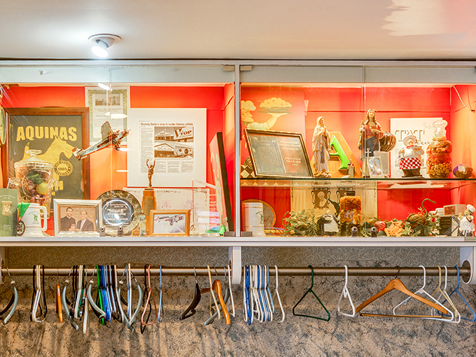 Display cases filled with memorabilia serve as time capsules, preserving the restaurant's history alongside coat hangers waiting for the next generation of diners.
