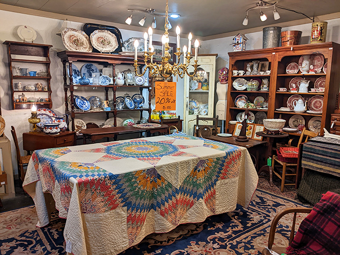A star quilt draped over a table creates an impromptu living room vignette that feels like walking into your favorite aunt's house.
