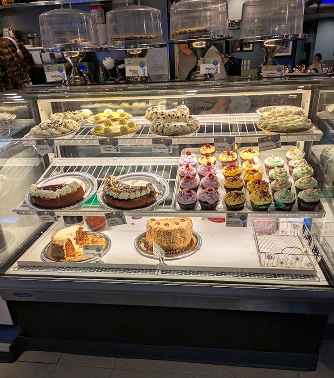 A dessert case that makes choosing just one sweet treat feel like Sophie's Choice. The cupcakes are practically waving at you.