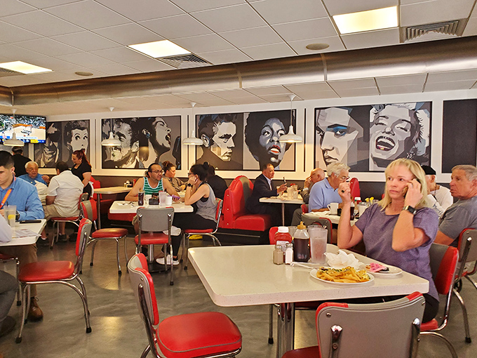 The dining room buzzes with conversation and clinking silverware&mdash;a symphony of satisfaction conducted under the gaze of silver screen legends.