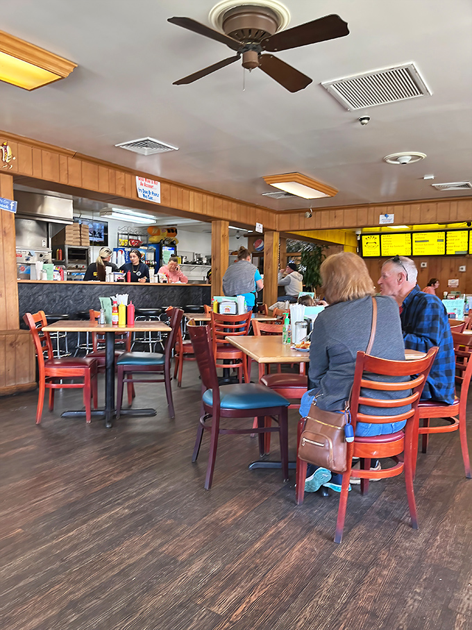 The dining room hums with the satisfied murmurs of regulars who've been coming here since before cell phones existed.