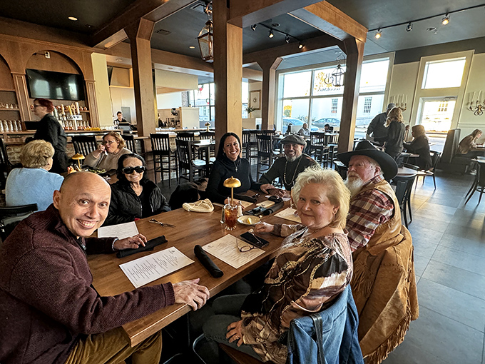 Where memories are made: diners gather around wooden tables, proving that good food tastes even better when shared with good company.