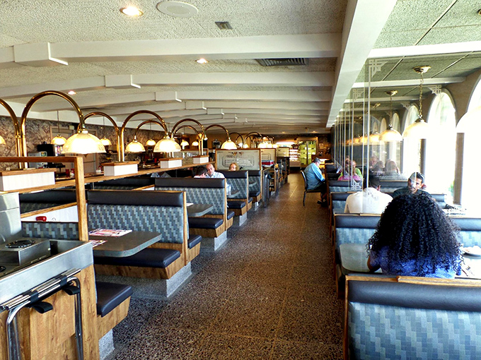 Another angle reveals the diner's perfect symmetry&mdash;where pendant lights create pools of golden illumination over booths that have witnessed countless first dates and family celebrations.