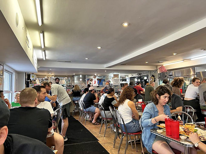 Lunchtime at Enriqueta's isn't just busy—it's a beautiful choreography of hungry patrons, efficient service, and the promise of imminent satisfaction.