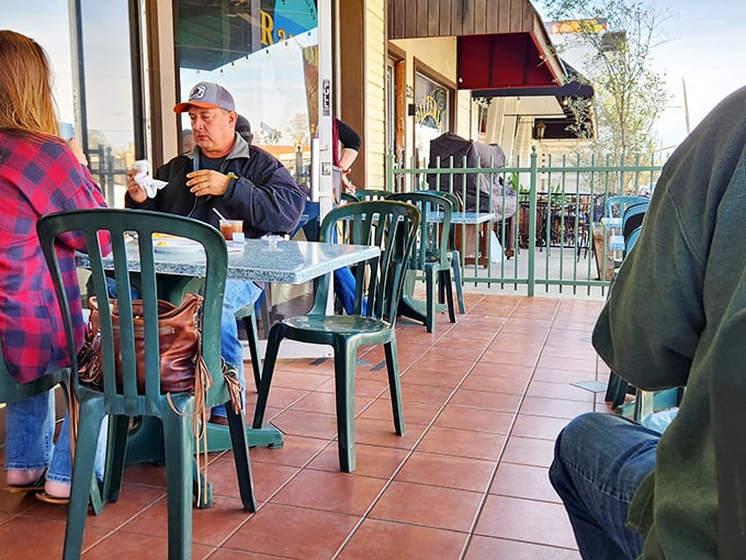 The outdoor patio where locals gather to debate important issues like whether pancakes or waffles reign supreme.
