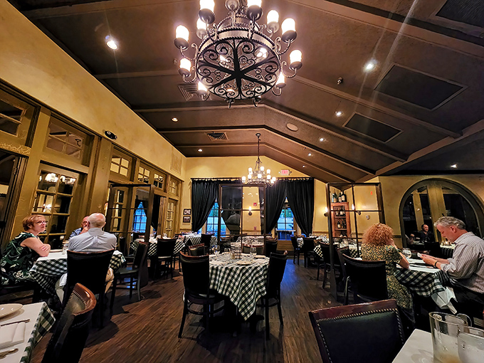 The vaulted ceilings and elegant chandeliers create an atmosphere where you feel both special and completely at home&mdash;like dining in a fancy friend's living room.