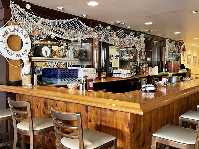 The counter where breakfast dreams come true. That nautical netting isn't just decor&mdash;it's a nod to the fresh seafood that graces many plates.