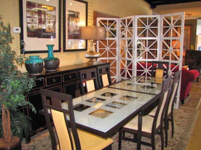 This glass-topped dining table with geometric chairs proves that sometimes transparency is the best policy in furniture design.